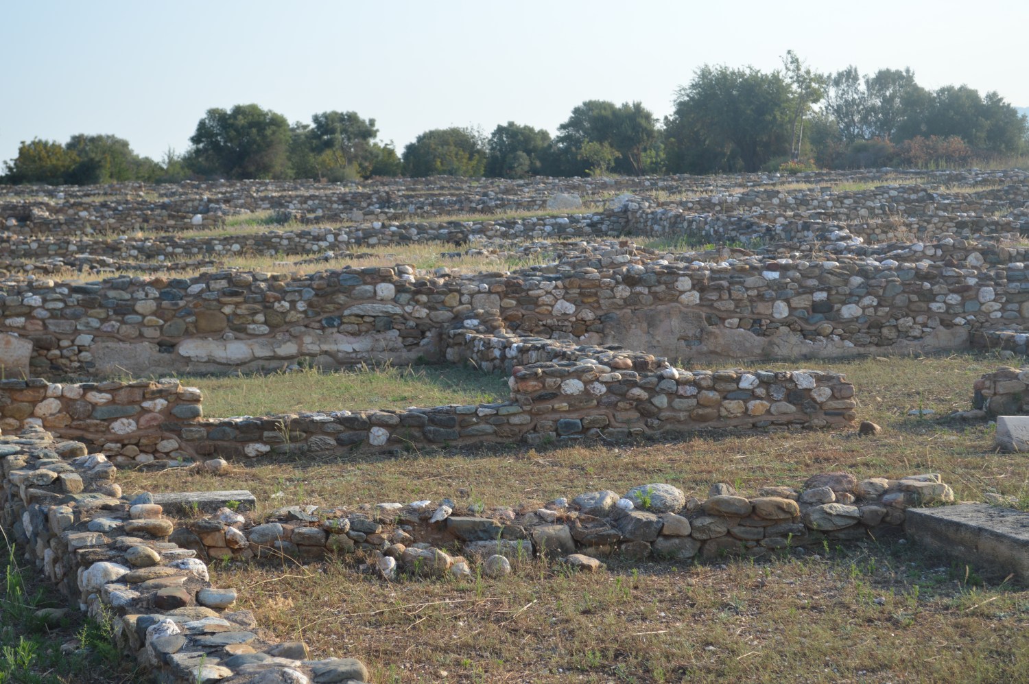 stone-foundations-partially-reconstructed-from-the-archaeological-site ...